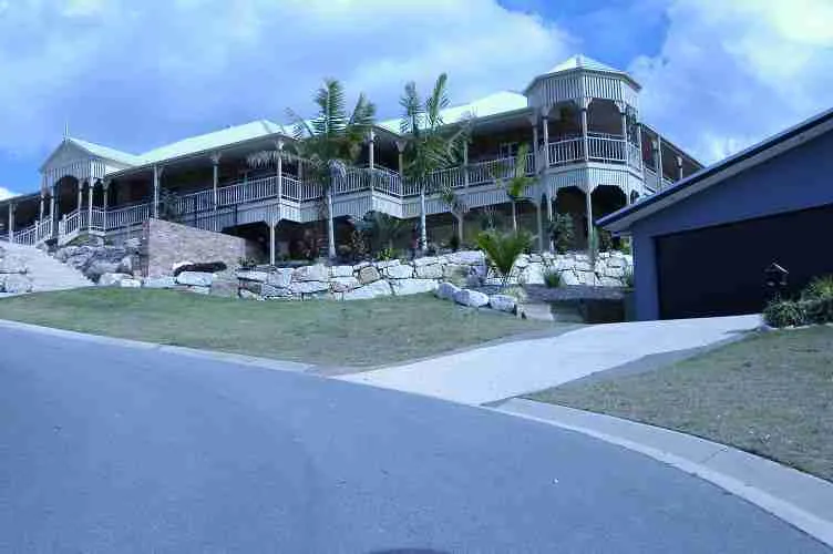 Expertly Crafted Boulder Walls: Transforming Sloping Land into ...